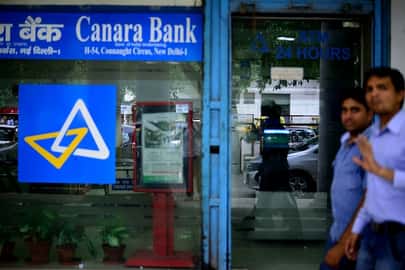 Canara Bank shares jump 6% to hit 52-week high on stock split plan ...