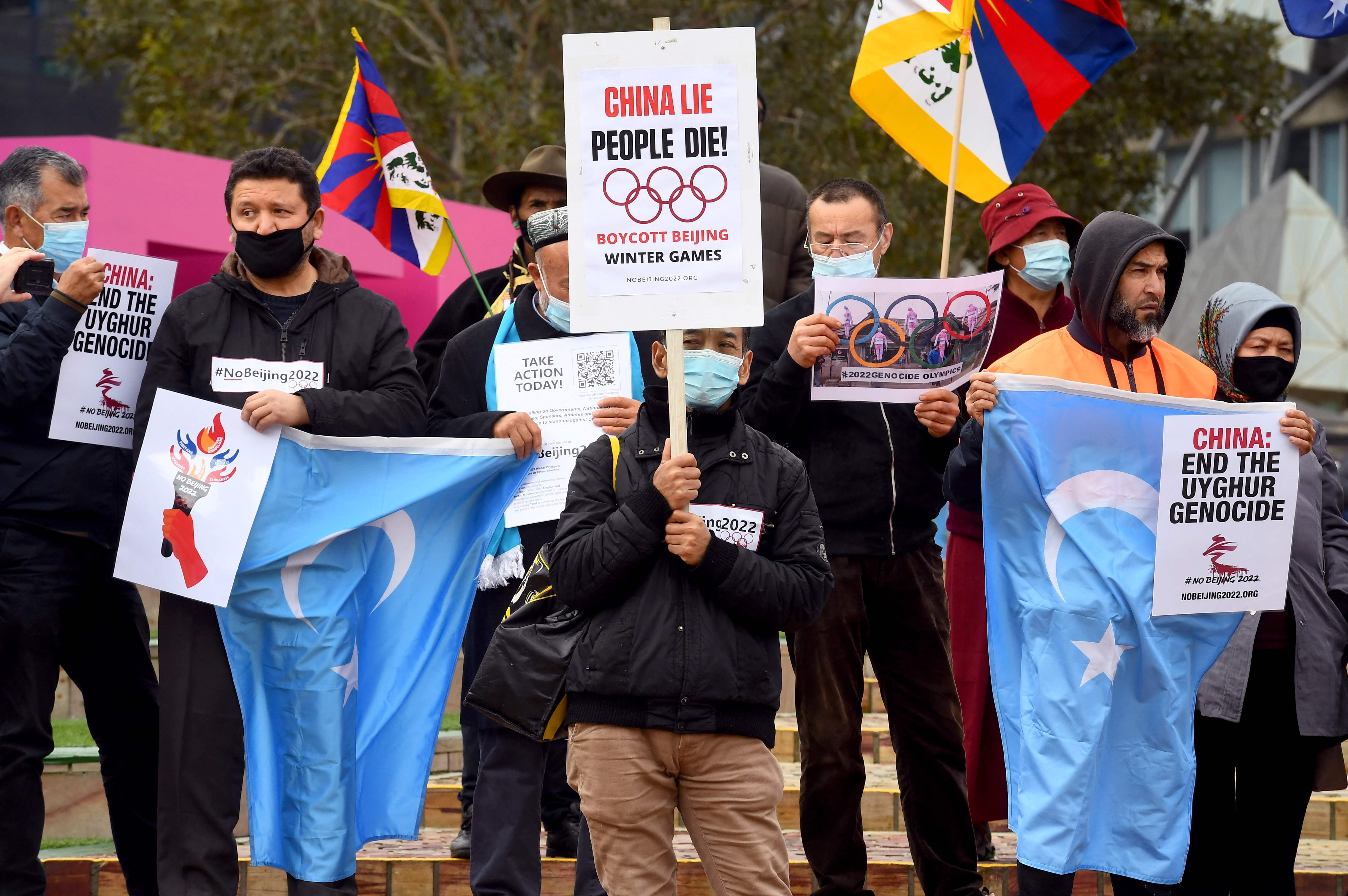 In Photos: On International Olympics Day, anti-Olympics protests ...